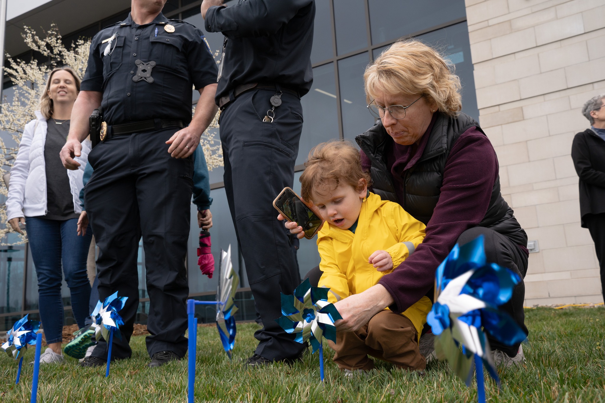 A ‘garden’ of blue pinwheels planted at Lawrence police headquarters in ...
